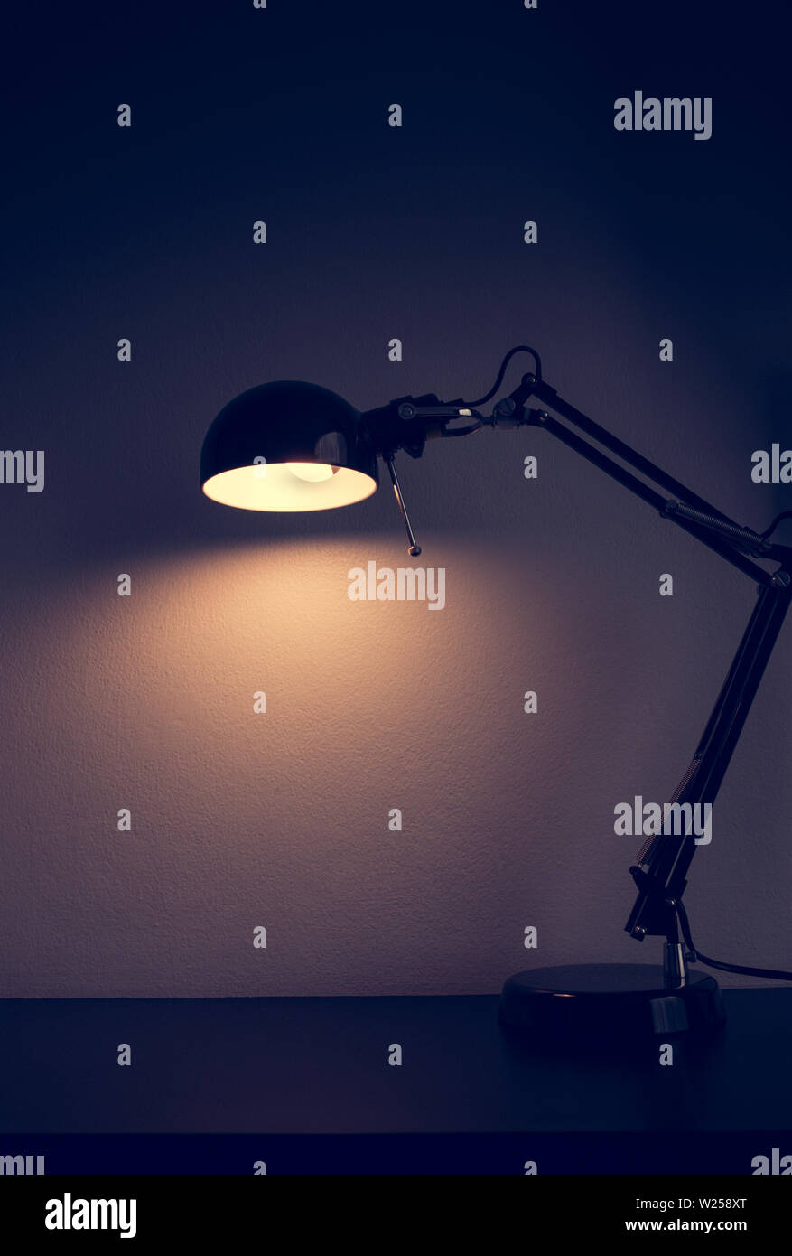Light bulb with wood house on the table hi-res stock photography and ...