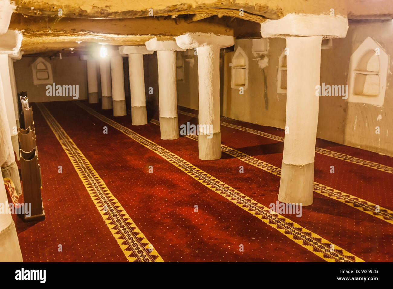 The interior of the restored mud brick mosque in the Ushaiqer Heritage ...