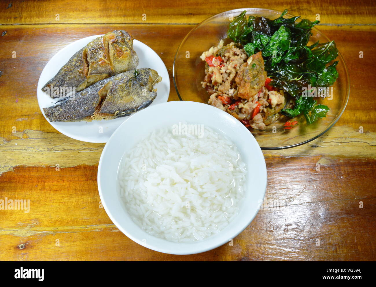 rice porridge eat with stir fried crispy basil leaf with black ...
