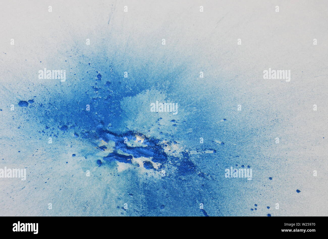 color powder spread on white paper Stock Photo - Alamy