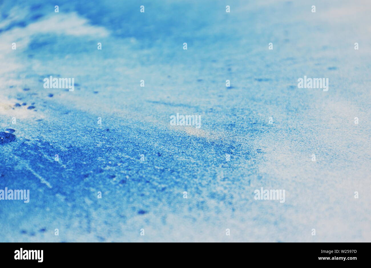 color powder spread on white paper Stock Photo - Alamy