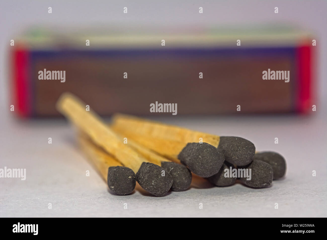 Matches sticks stack together in white background Stock Photo - Alamy