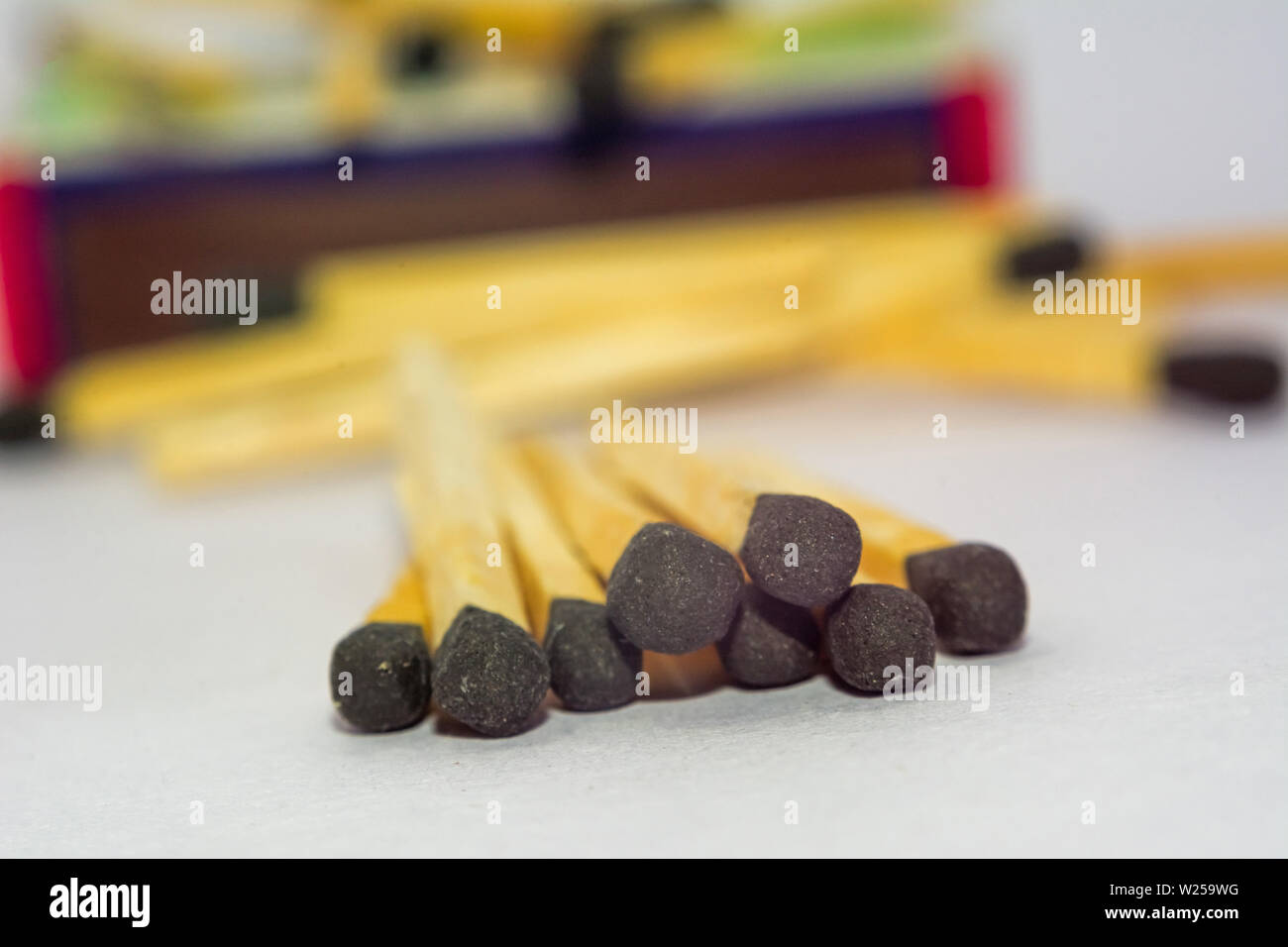 Matches sticks stack together in white background Stock Photo - Alamy
