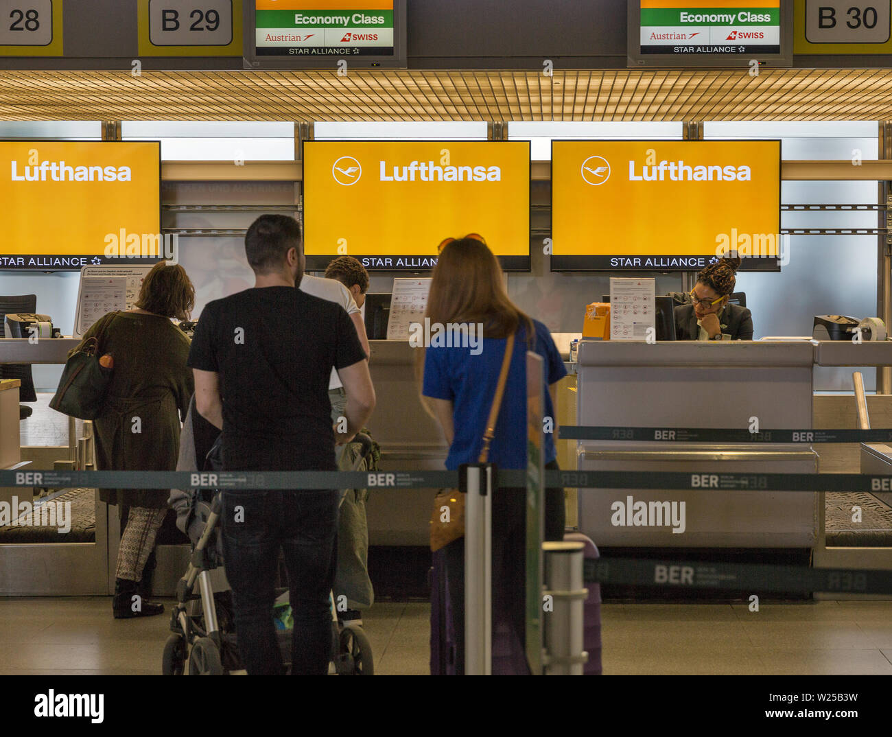 BERLIN, GERMANY - APRIL 20, 2019: People visit Lufthansa check in ...