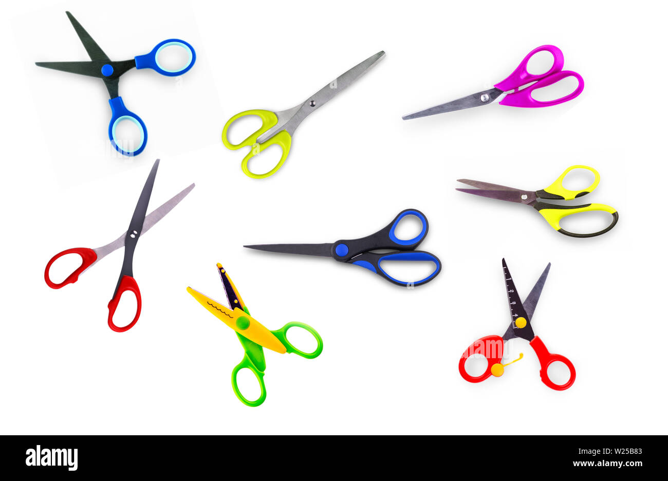 Colored handled scissorses isolated on white background Stock Photo - Alamy