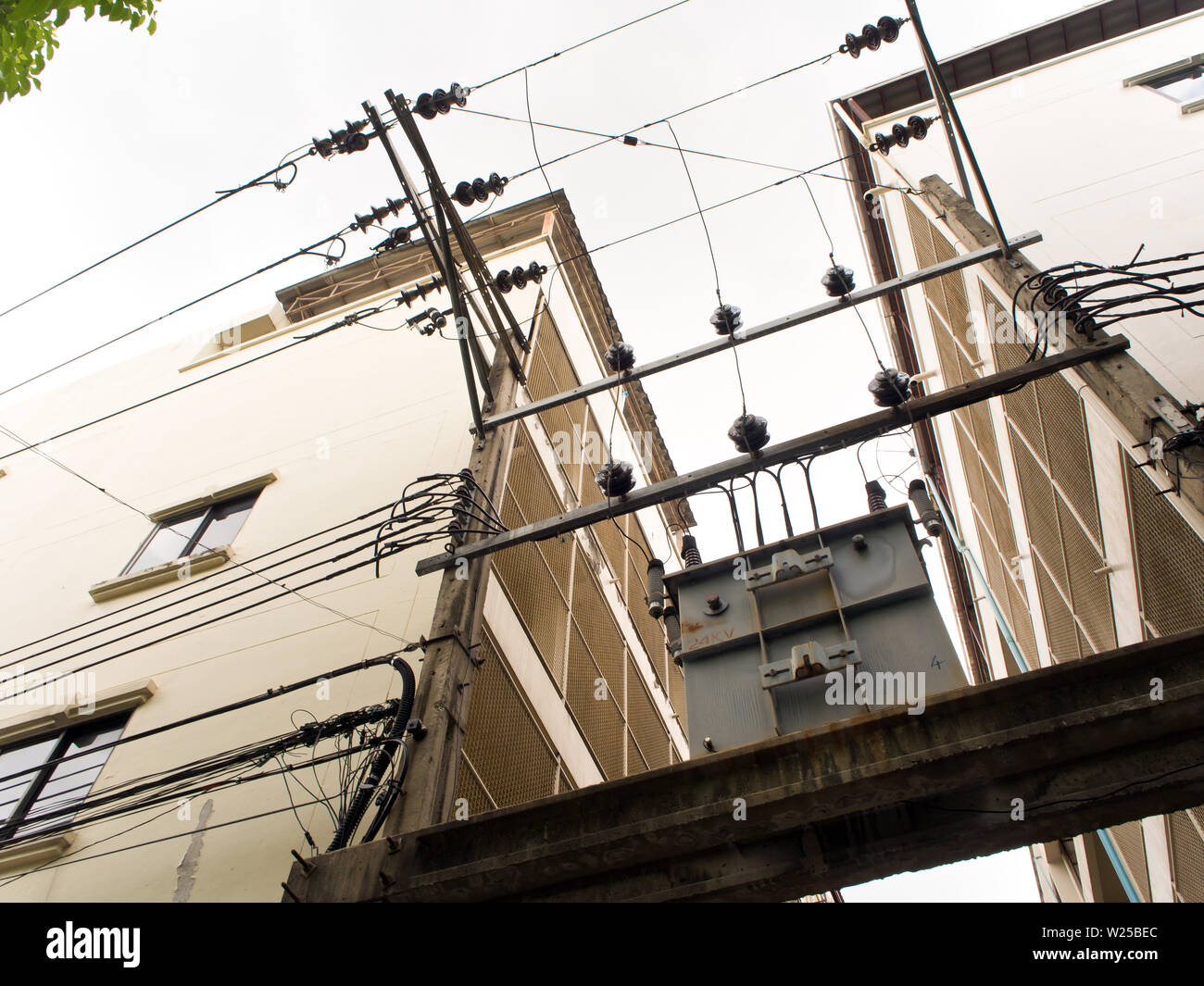 Electrical transformer on concrete pole Stock Photo - Alamy