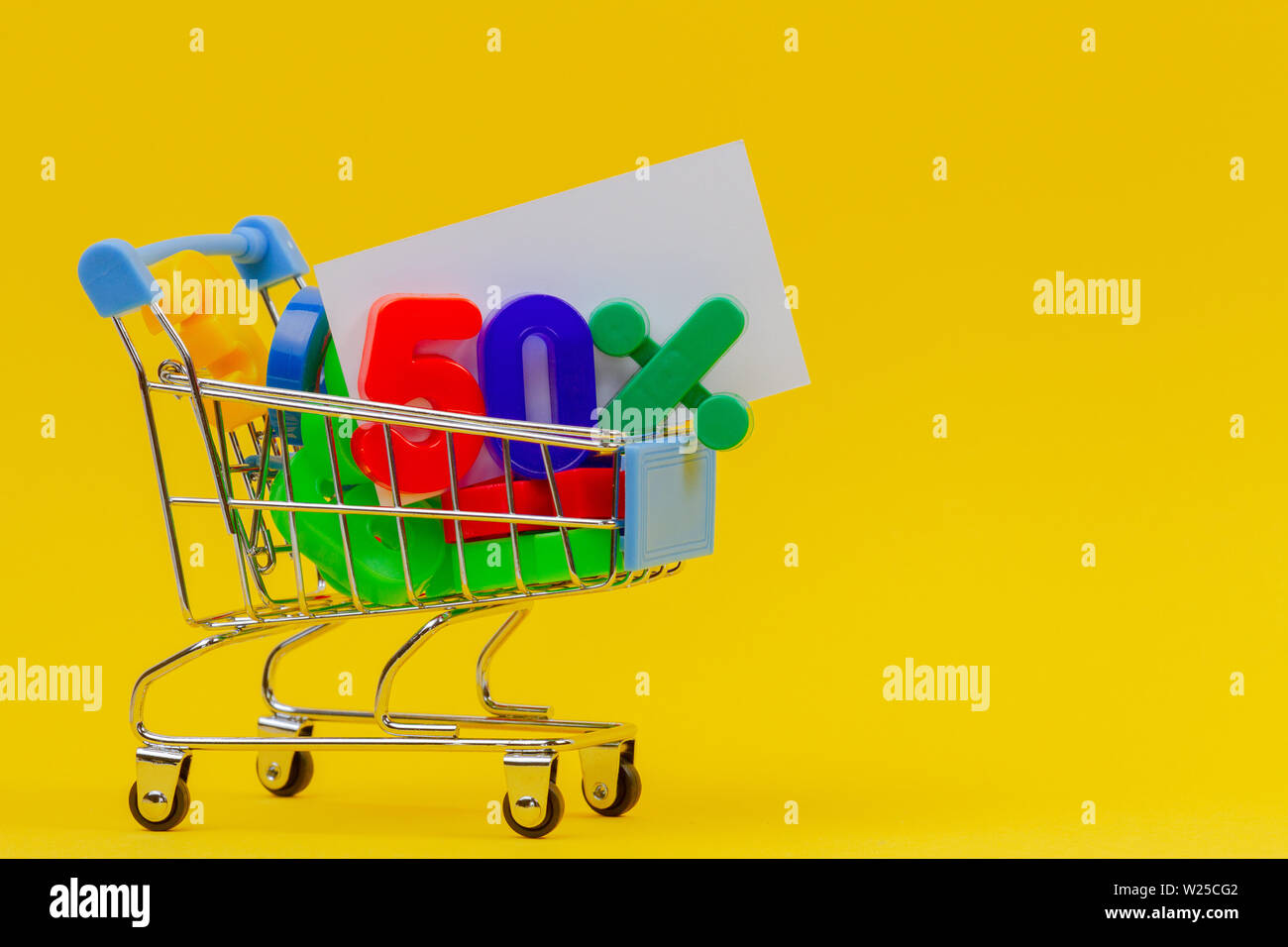 Shopping cart or supermarket trolley with fifty percent sign and full ...