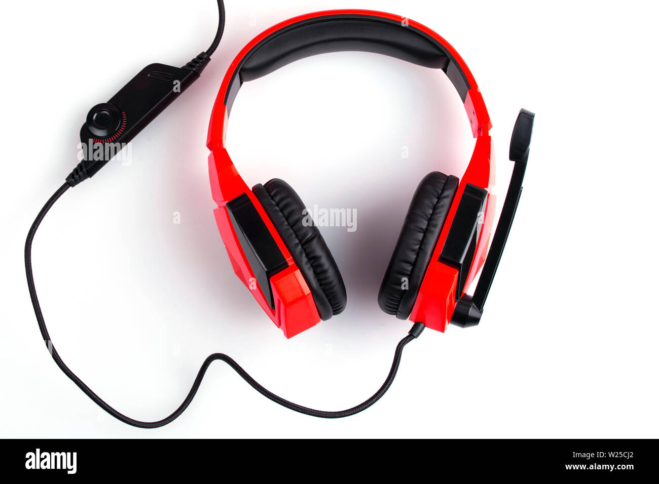 Red headphones with a microphone isolated on white background Stock ...