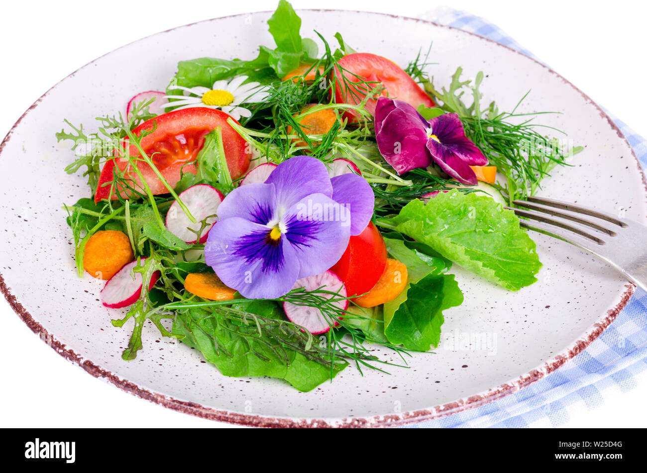 Vegetable salad with edible flowers on white background Stock Photo - Alamy