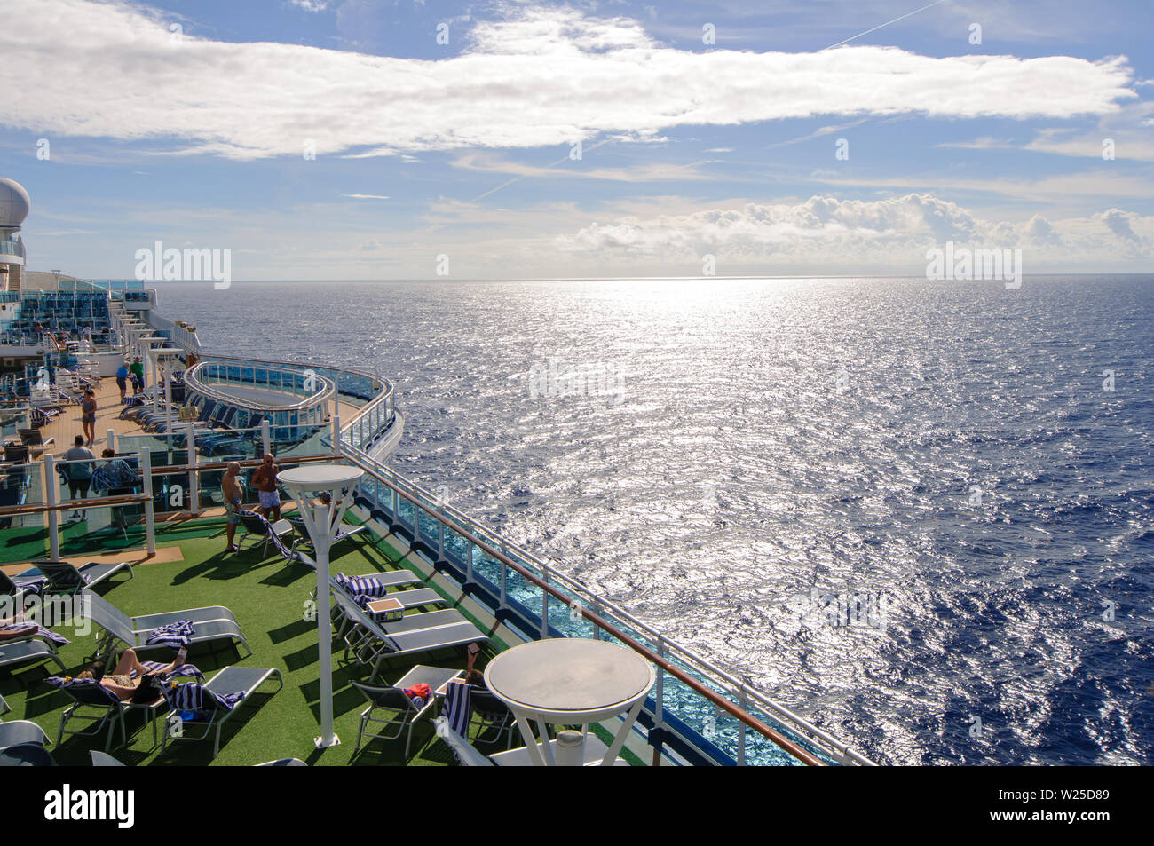 Sea view from the top deck of the cruise ship. Against the light Stock ...