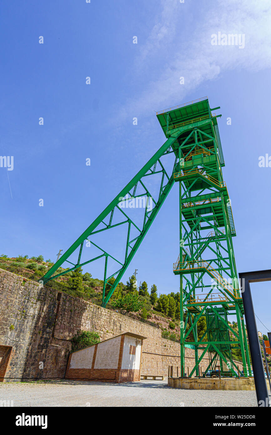 Green tower of a well extraction of a mine of salt or potash in disuse ...
