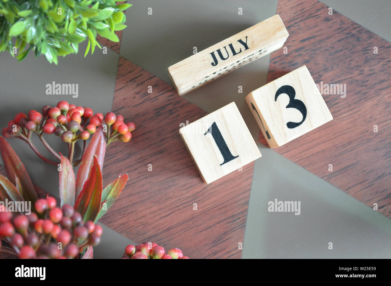 Date of July month. Diamond wood table for background Stock Photo - Alamy