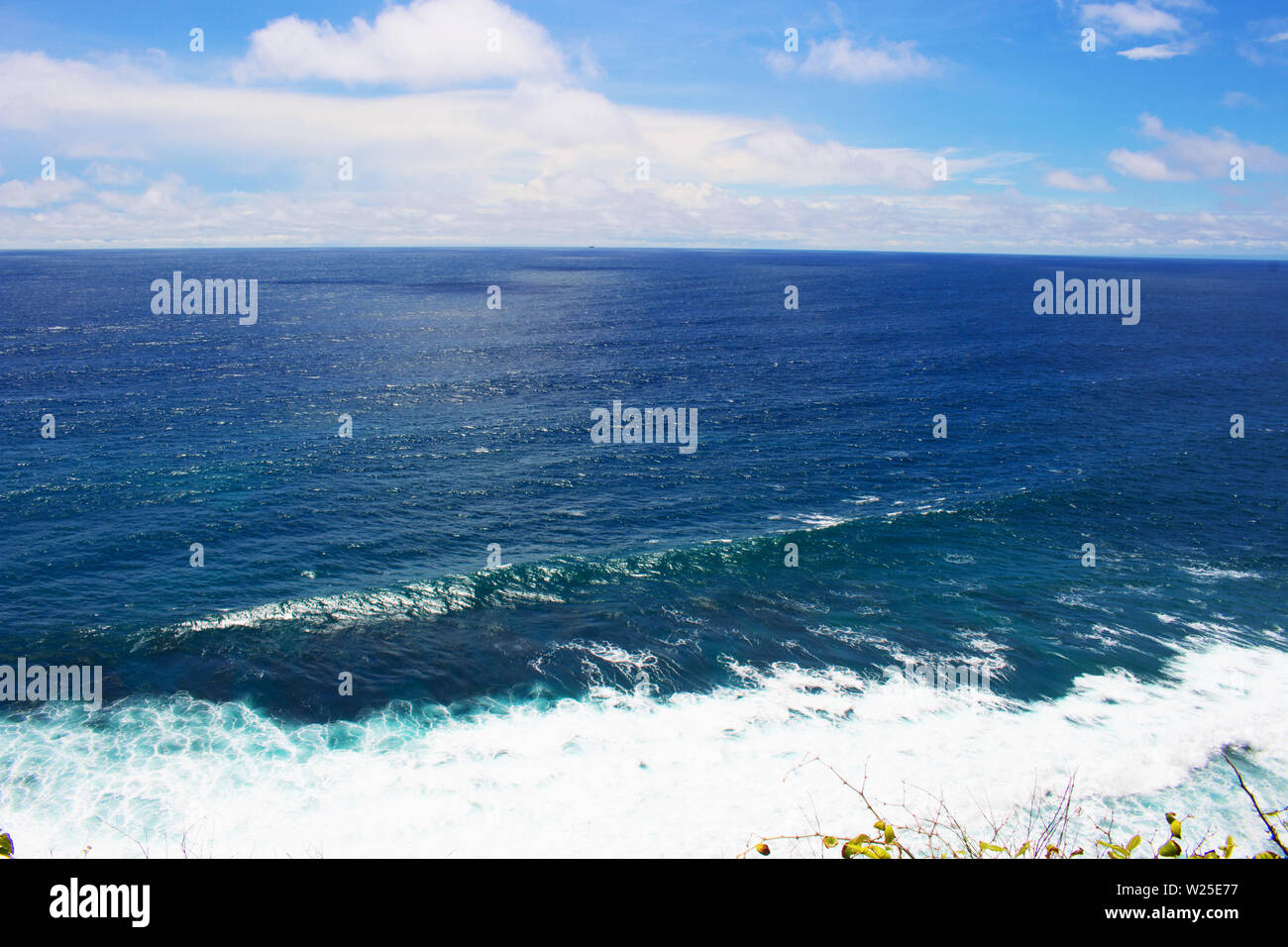 White Wave Crush in Deep Blue Seaside Stock Photo - Alamy