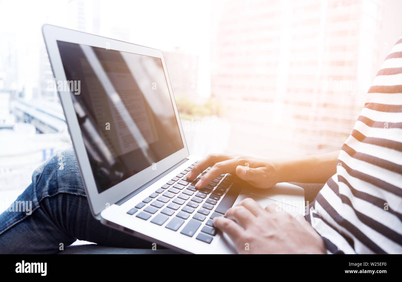 Young businessman multitasking using laptop.Business technology ...