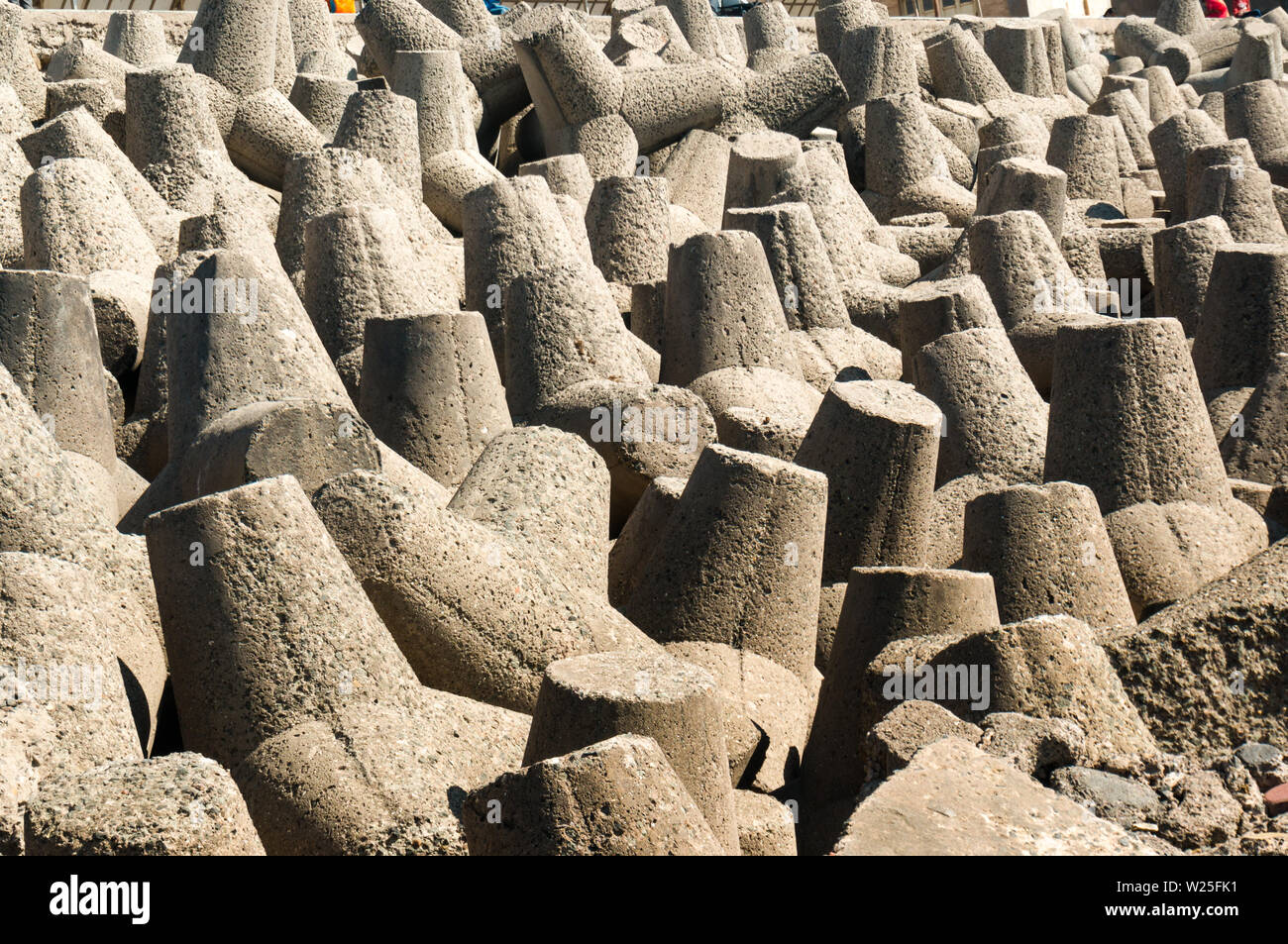 Wave breaker concrete rocks on the side of coastline in Mumbai, Gujarat ...