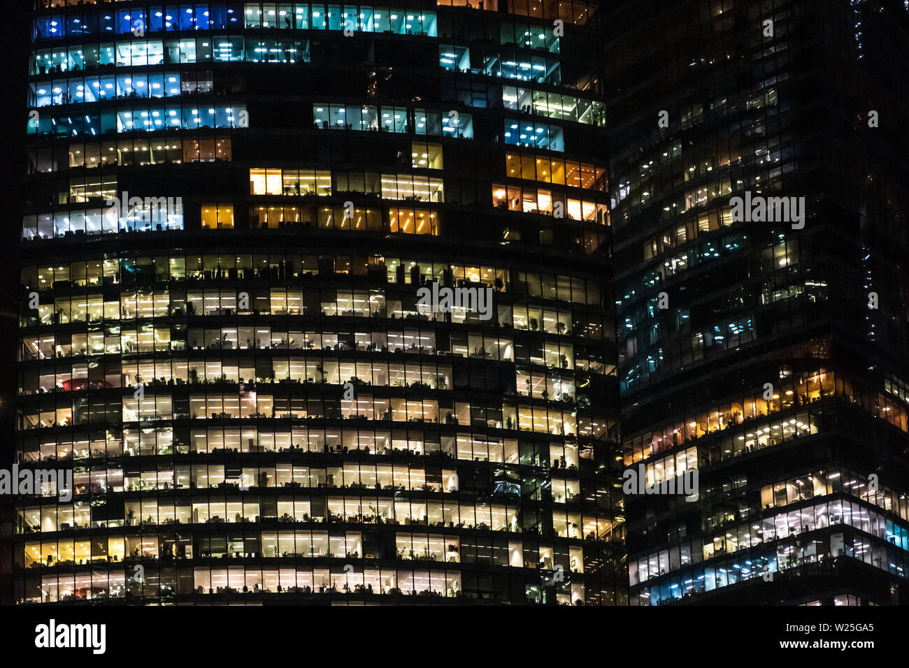 Night photo of the business center skyscraper close-up Stock Photo - Alamy
