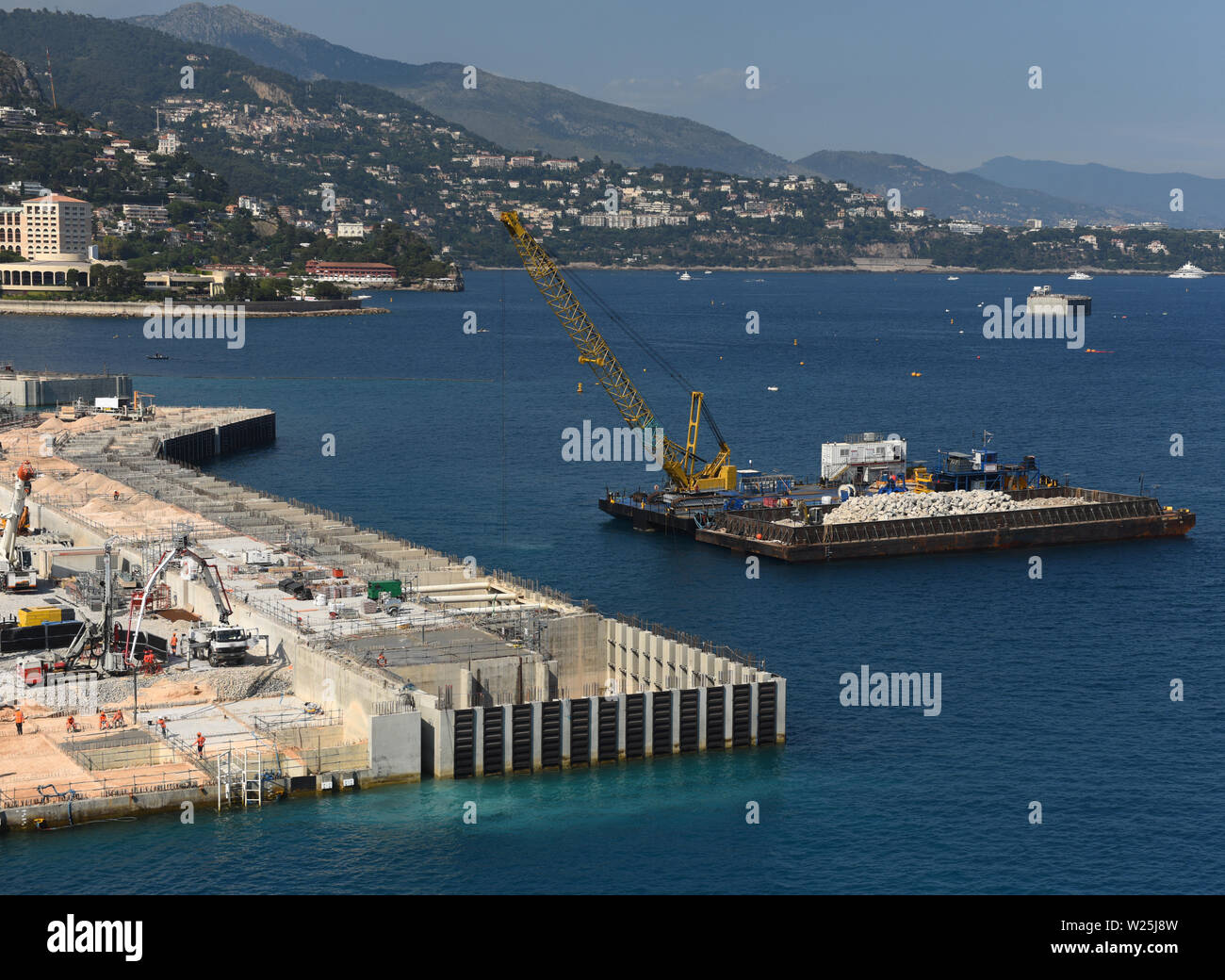 Building construction in Monaco. Construction crane Stock Photo - Alamy