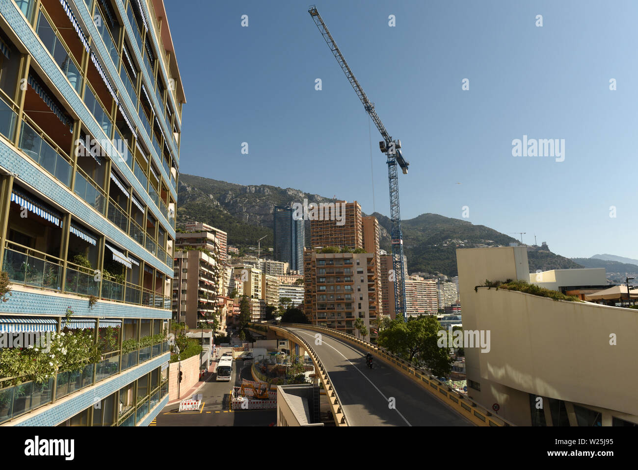 Building construction in Monaco. Construction crane Stock Photo - Alamy