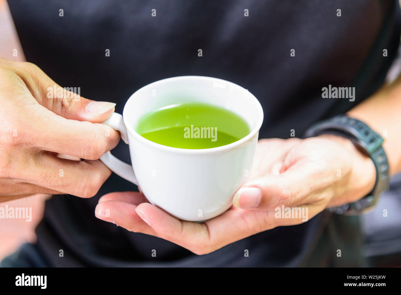 Man Drinking Green Tea