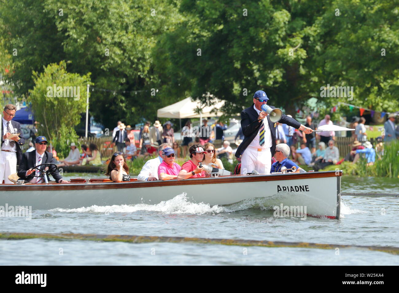 The Umpire boat with Sir Matthew Pinsent as umpire follows the ...