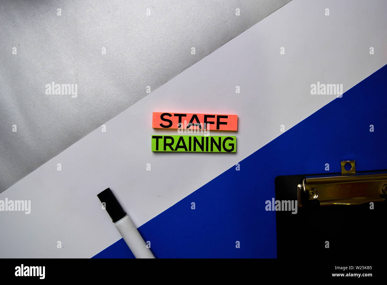 Staff Training text on sticky notes with color office desk concept ...