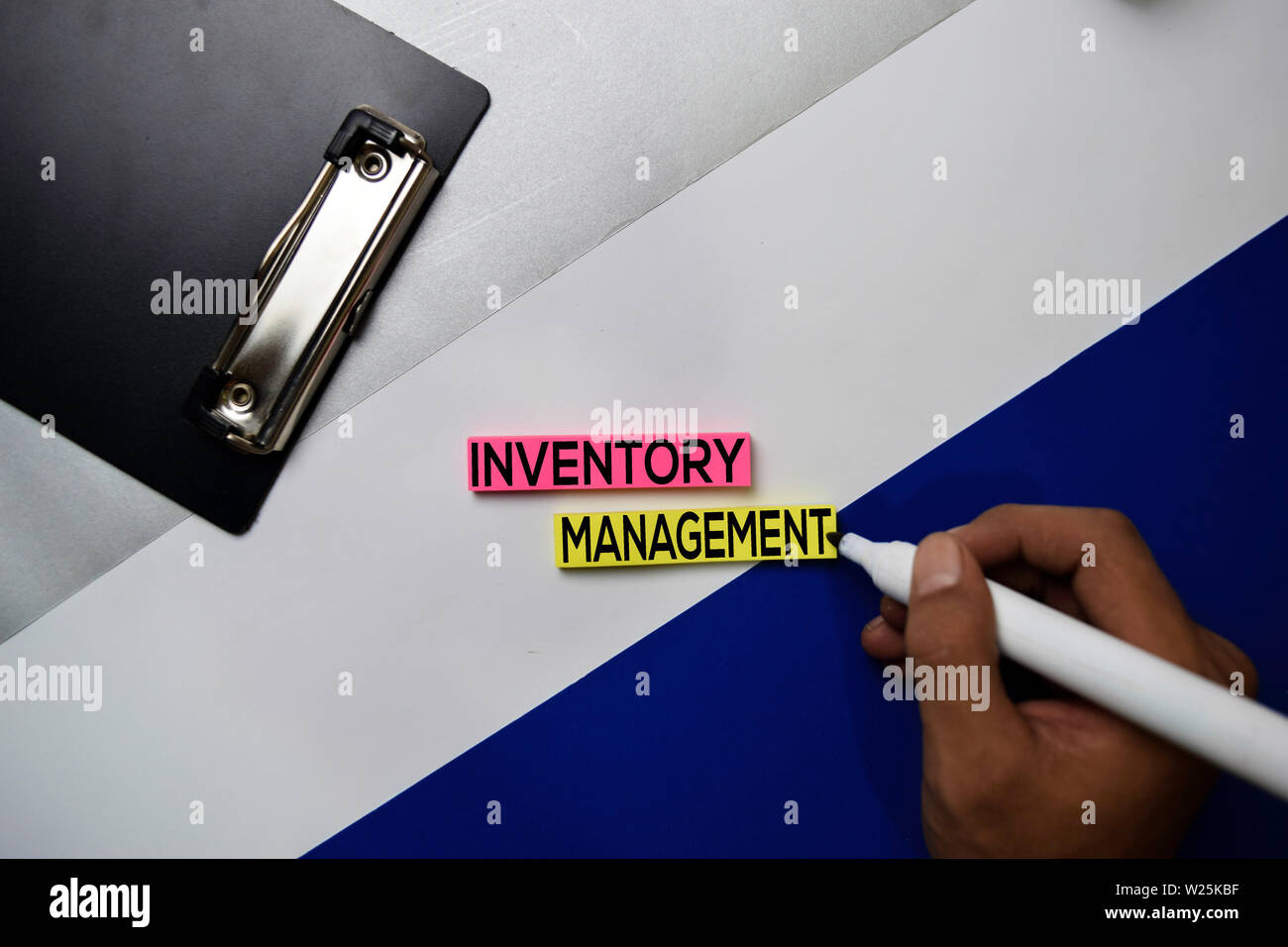 Inventory Management text on sticky notes with color office desk ...