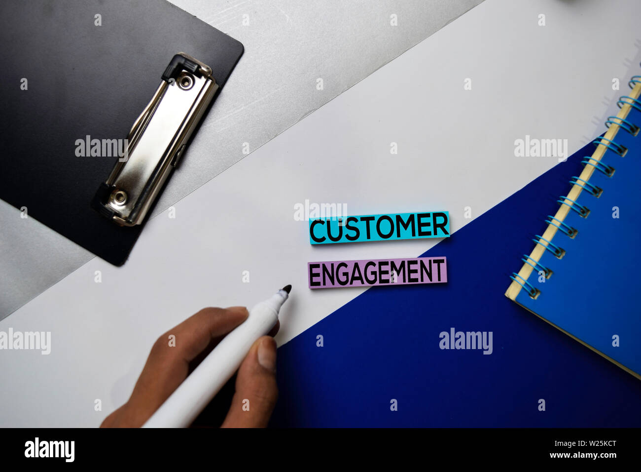 Customer Engagement text on sticky notes with color office desk concept ...