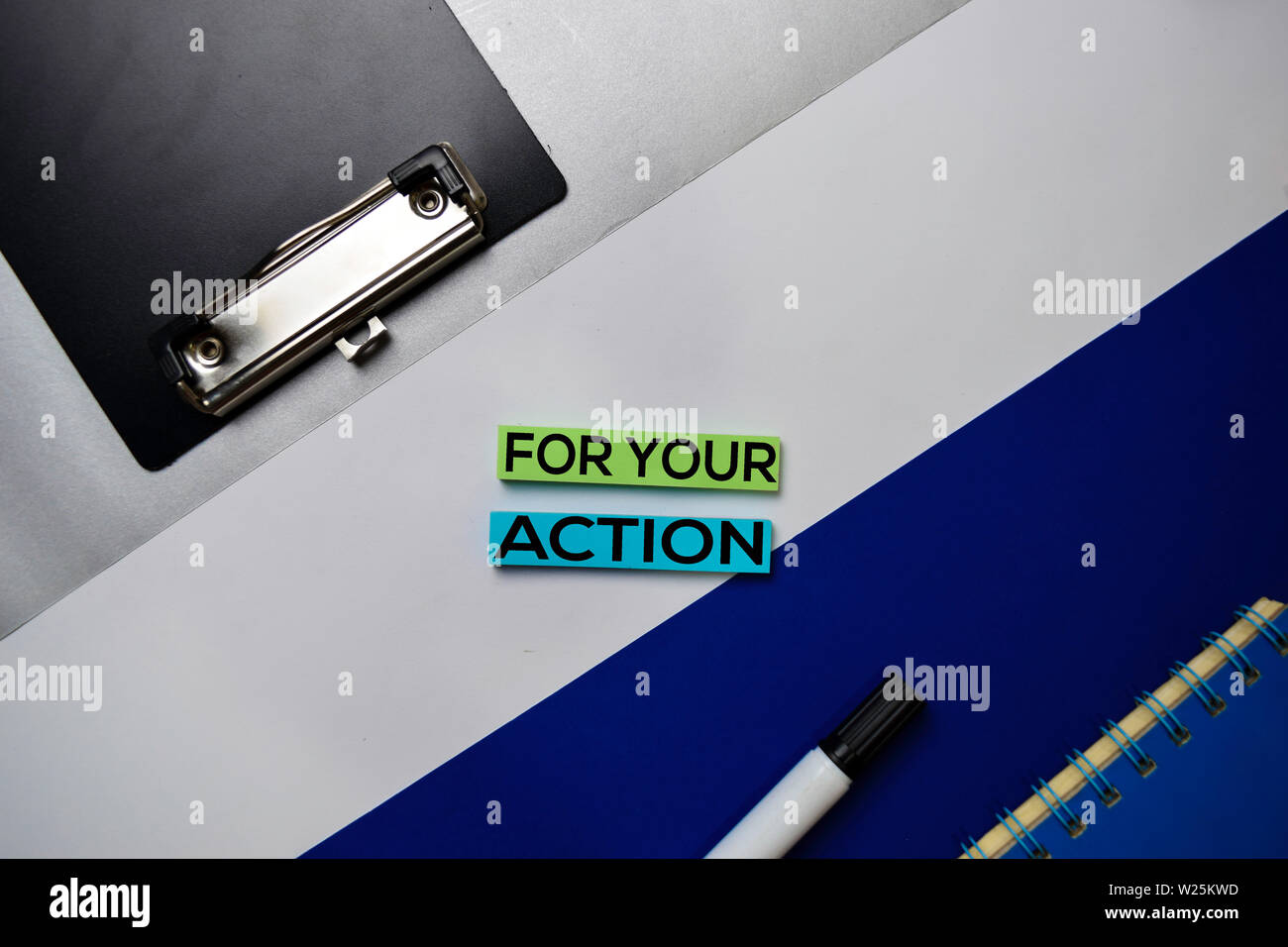 For Your Action (FYA) text on sticky notes with color office desk ...