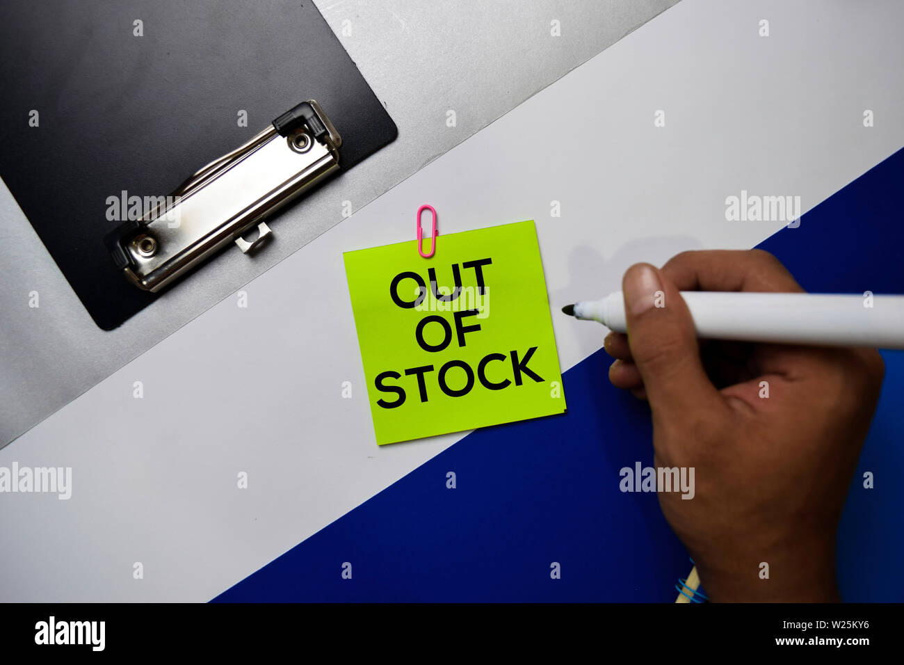 Out of Stock text on sticky notes with color office desk concept Stock ...