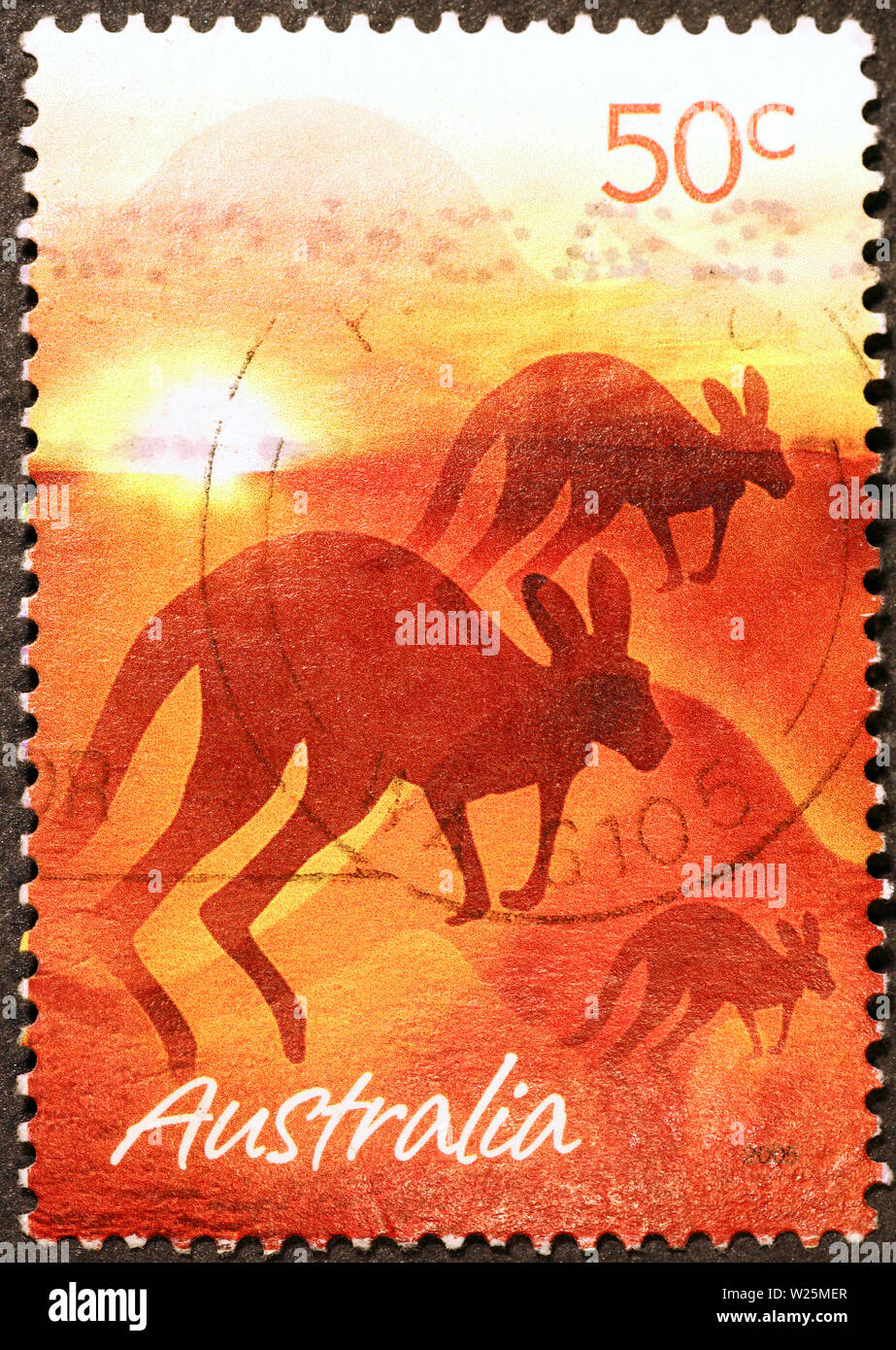 Kangaroo silhouettes at sunset on australian postage stamp Stock Photo ...