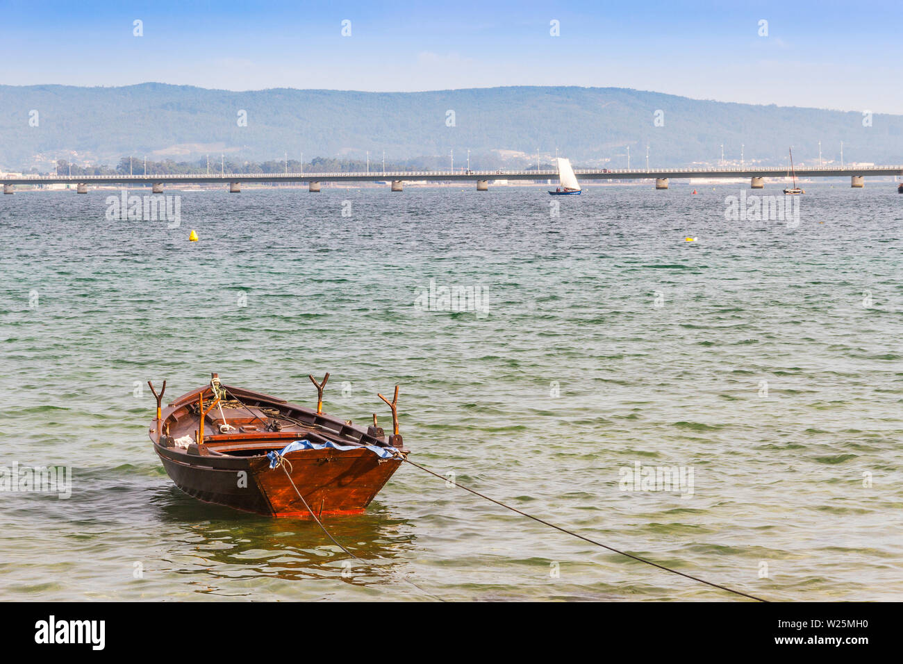 Anchored fishing boat in Arousa Island Stock Photo - Alamy
