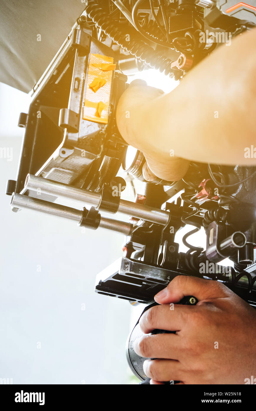 Filming with professional camera background Stock Photo - Alamy