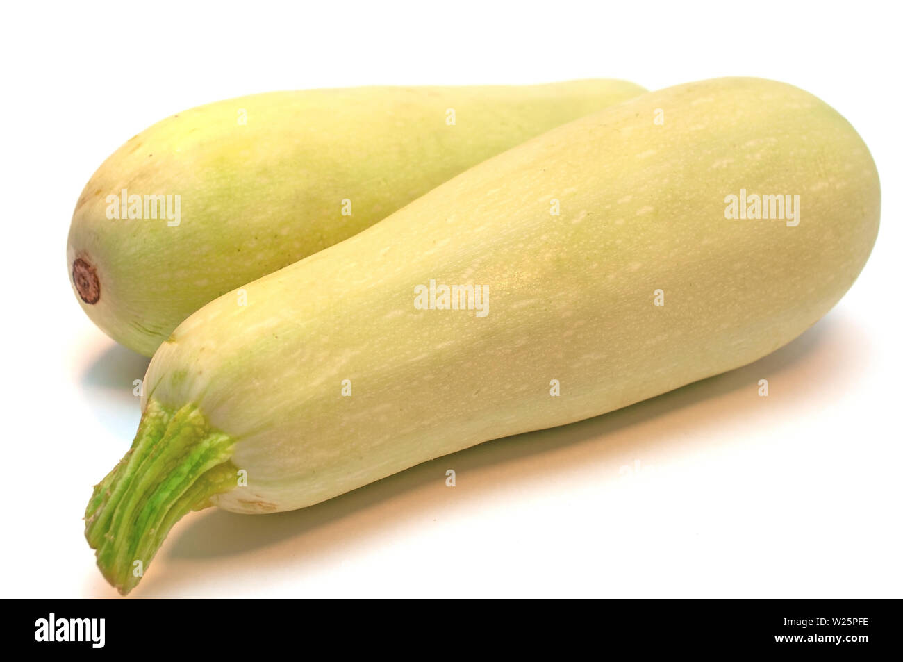 Fresh zucchini isolated on white background Stock Photo - Alamy