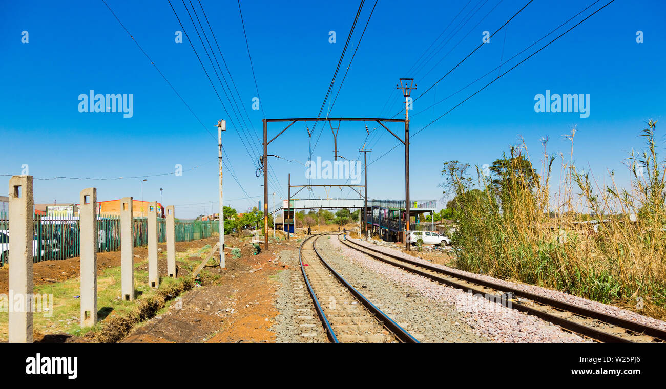 Soweto, South Africa - September 08 2018: Commuter Train moving through ...