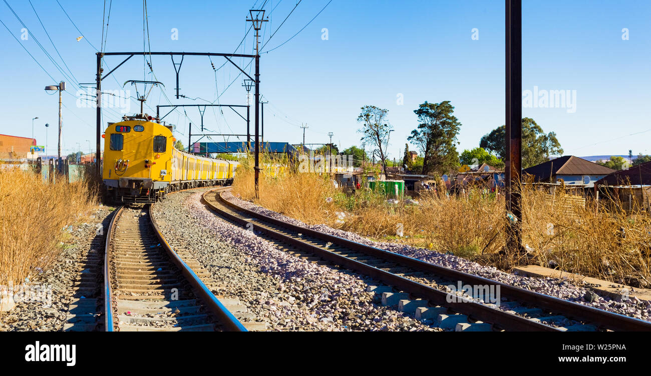 Soweto, South Africa - September 08 2018: Commuter Train moving through ...
