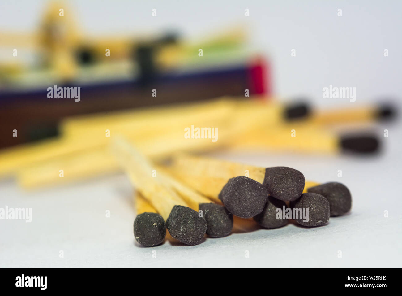 Matches sticks stack together in white background Stock Photo - Alamy