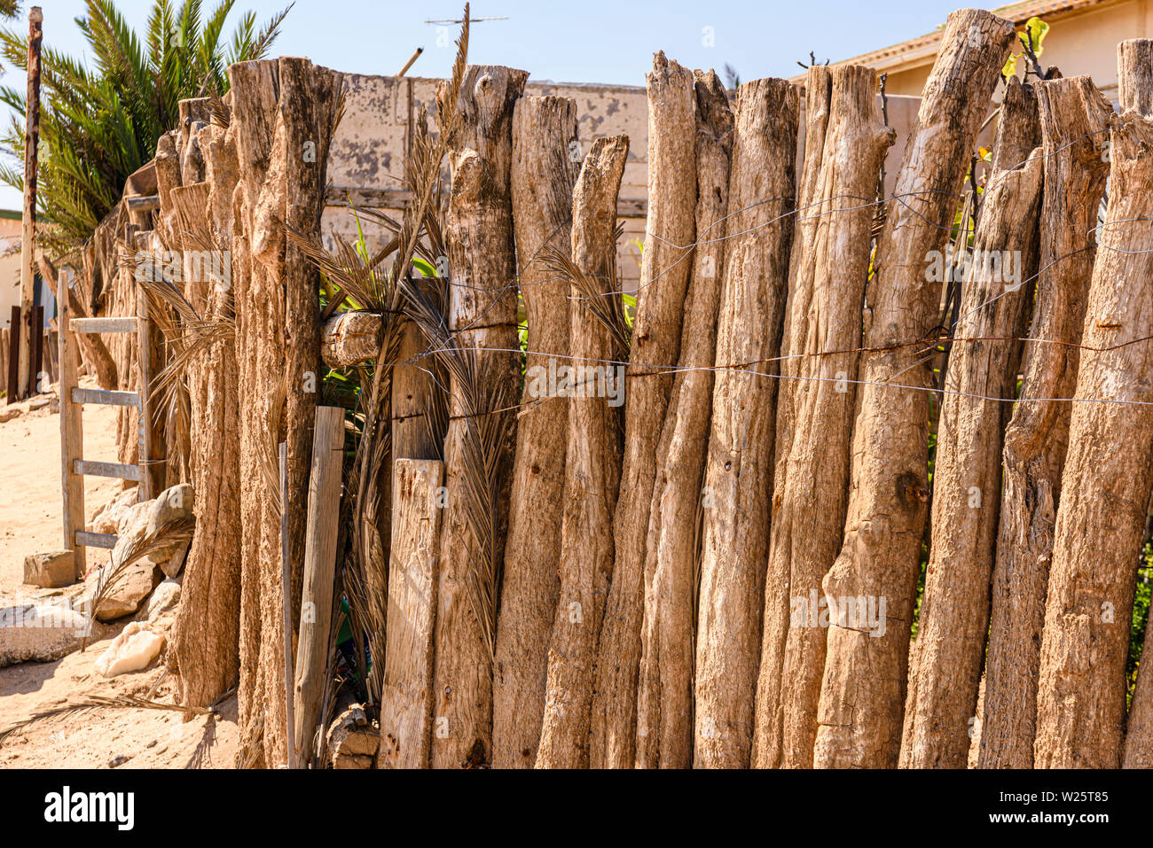 Rustic wooden fence around a house in Namibia Stock Photo - Alamy