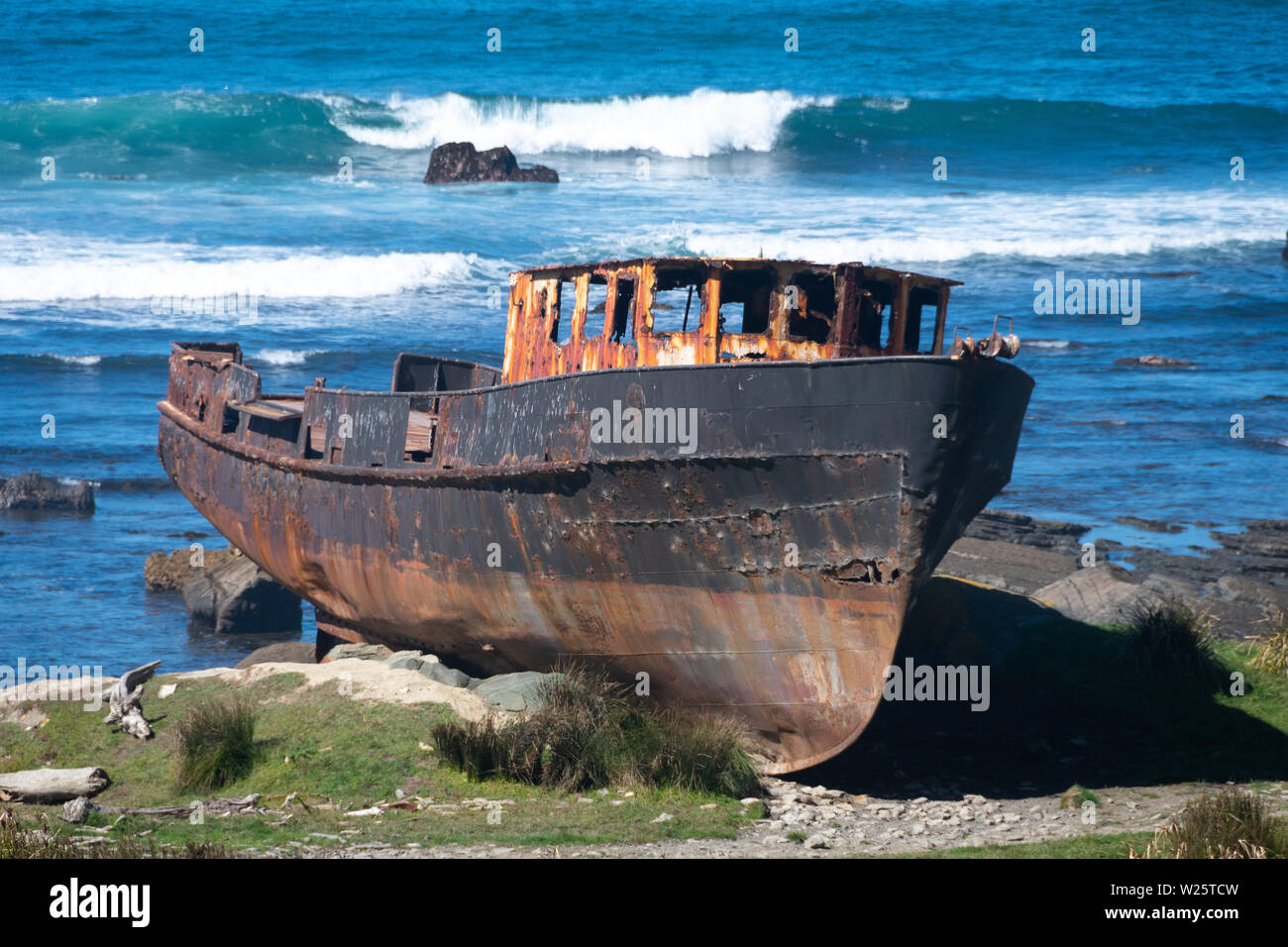 Fishing boat washed up on shore, White Rock, Wairarapa, North Island ...
