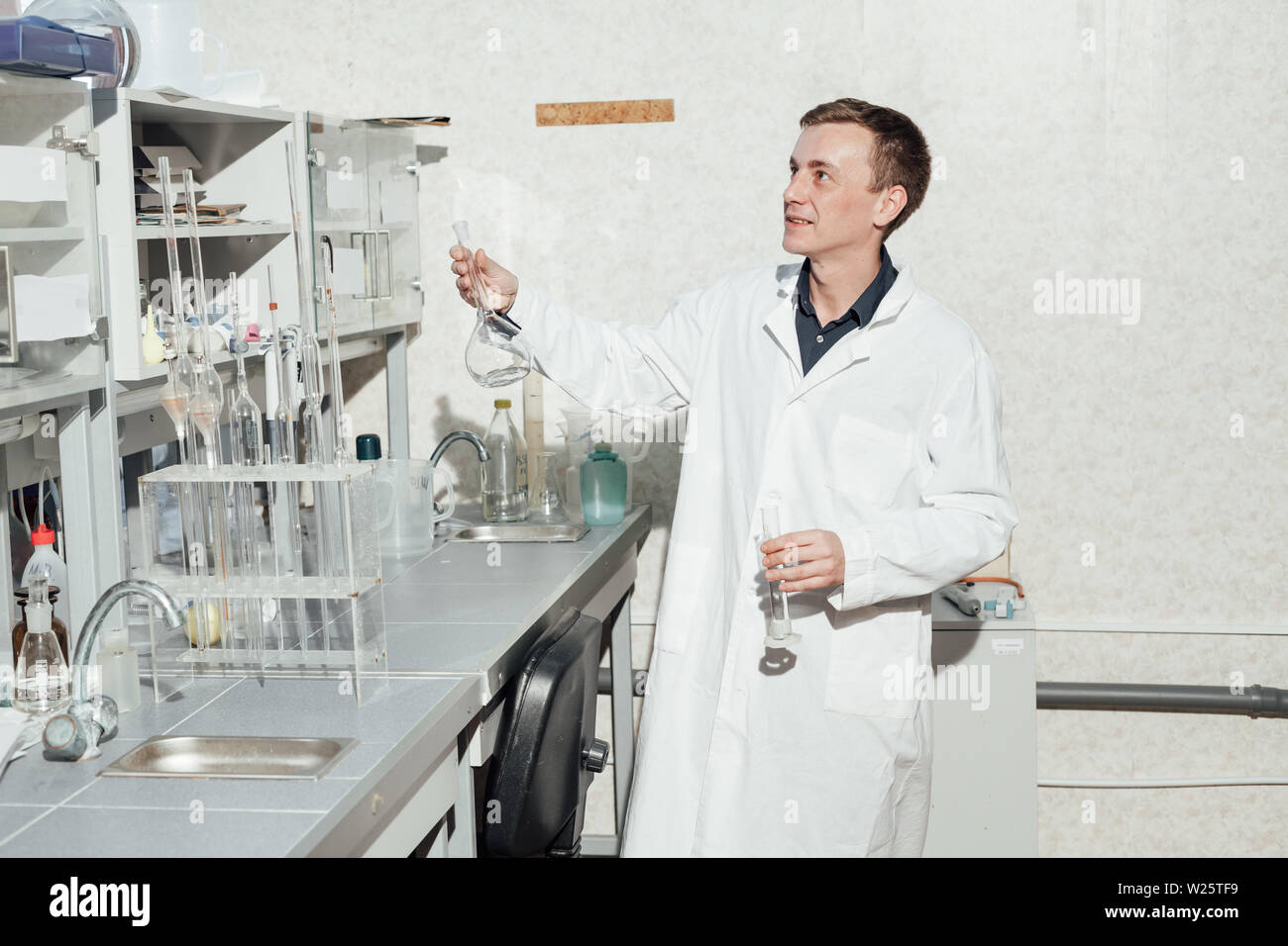 scientist conducts chemical experiments in the laboratory Stock Photo ...