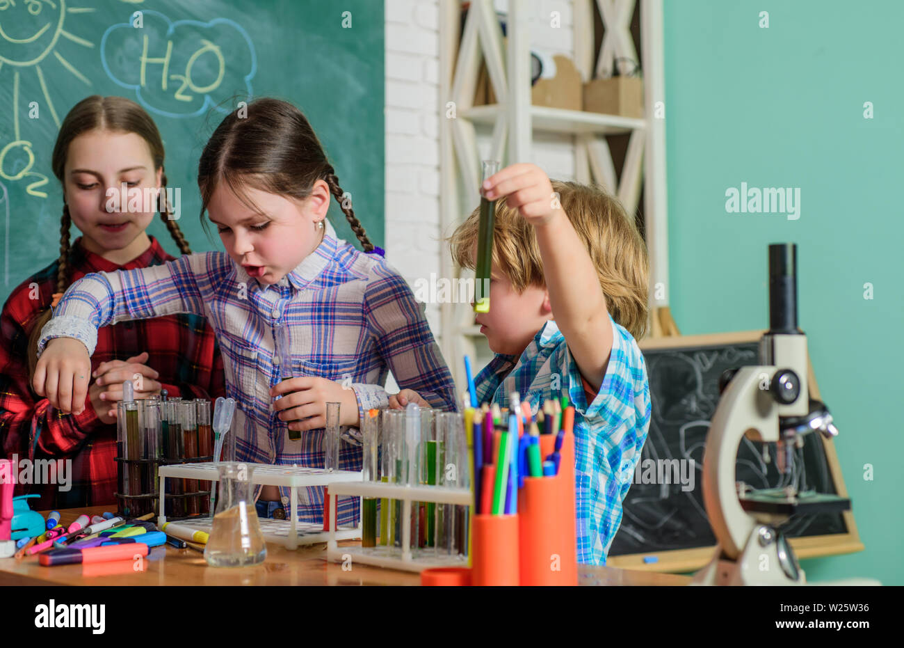 back to school. Educational. children scientists making experiments in ...