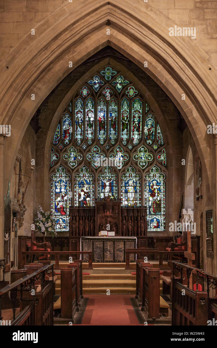 Inside the 12th Century Cheltenham Minster with it's beautiful arch and ...
