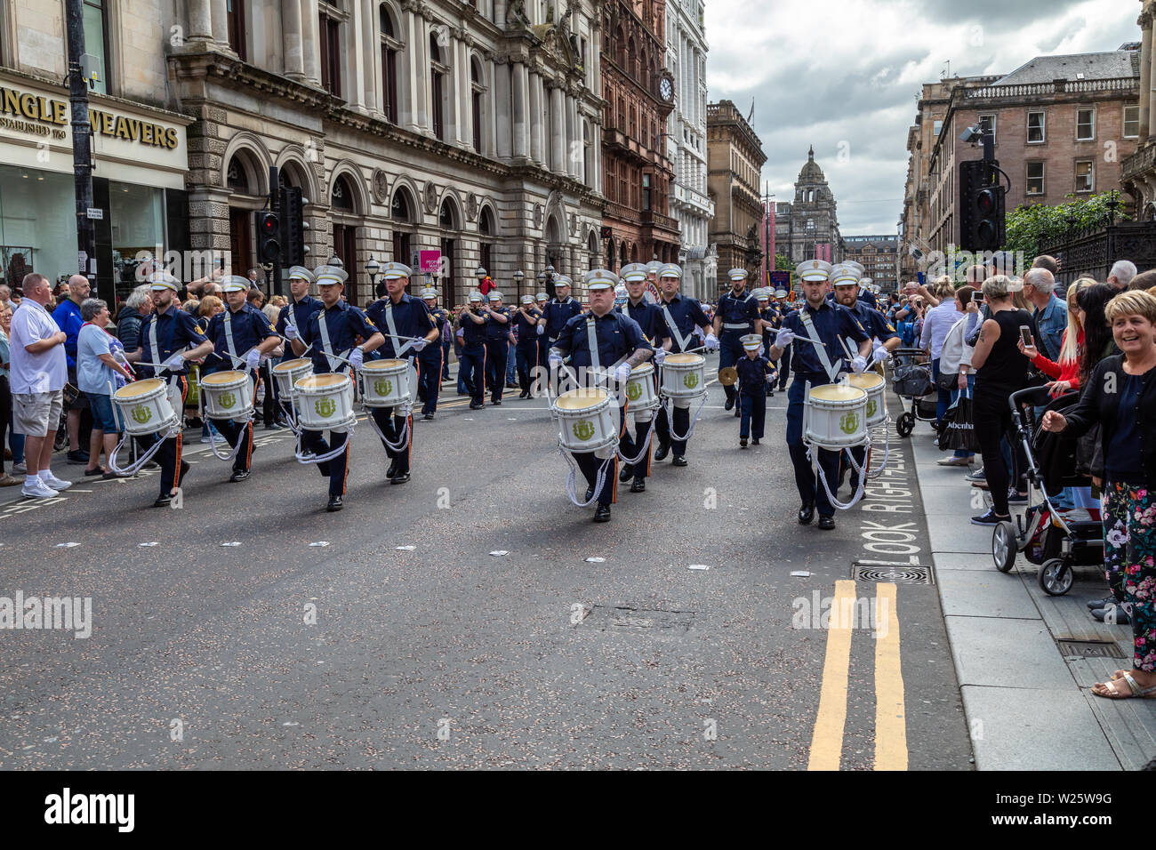 The 2019 annual Orange Walk in Glasgow attracts thousands of onlookers ...