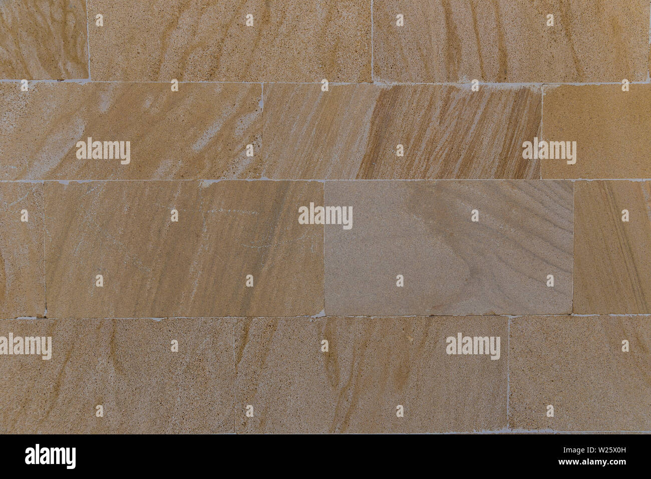The texture of the wall lined with stone slabs Stock Photo - Alamy
