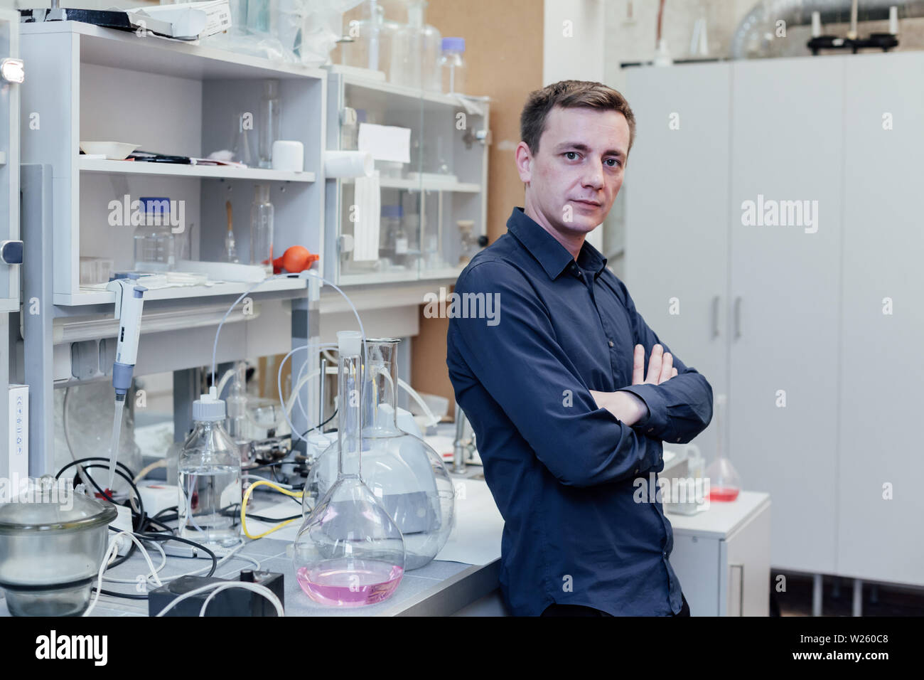 Scientist in a laboratory analyzes lab. analysis, dna, bio ...