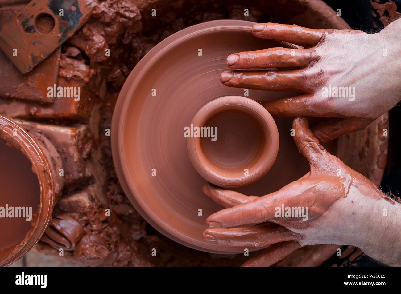 Professional potter making bowl in pottery workshop, studio Stock Photo ...