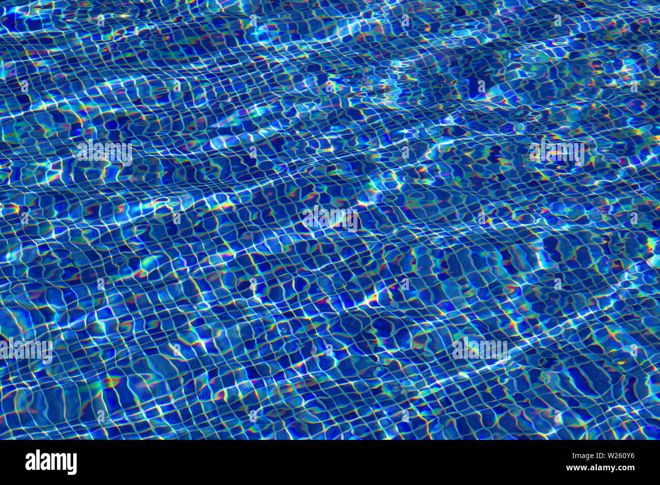 beautiful clear pool water reflecting in the sun Stock Photo - Alamy