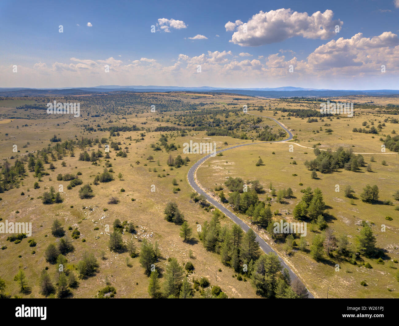 Sealed Winding road through calcareous limestone karst landscape of ...