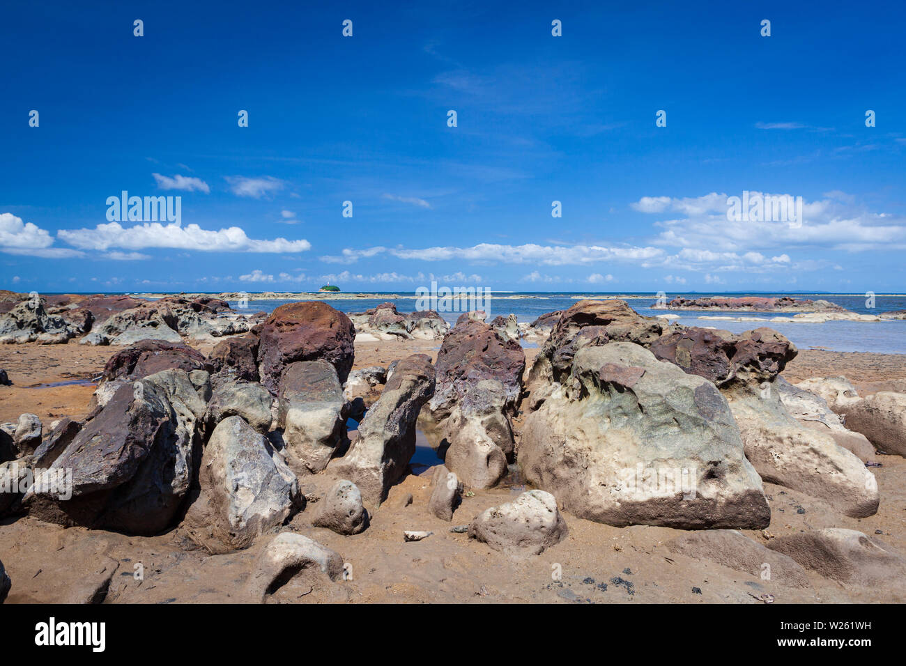Rock formations at beach in tip of Borneo Stock Photo - Alamy