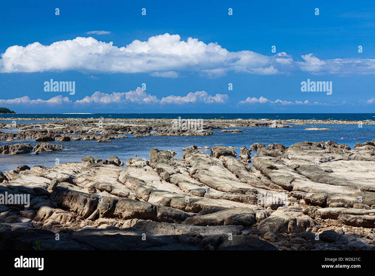 Rock formations at beach in tip of Borneo Stock Photo - Alamy
