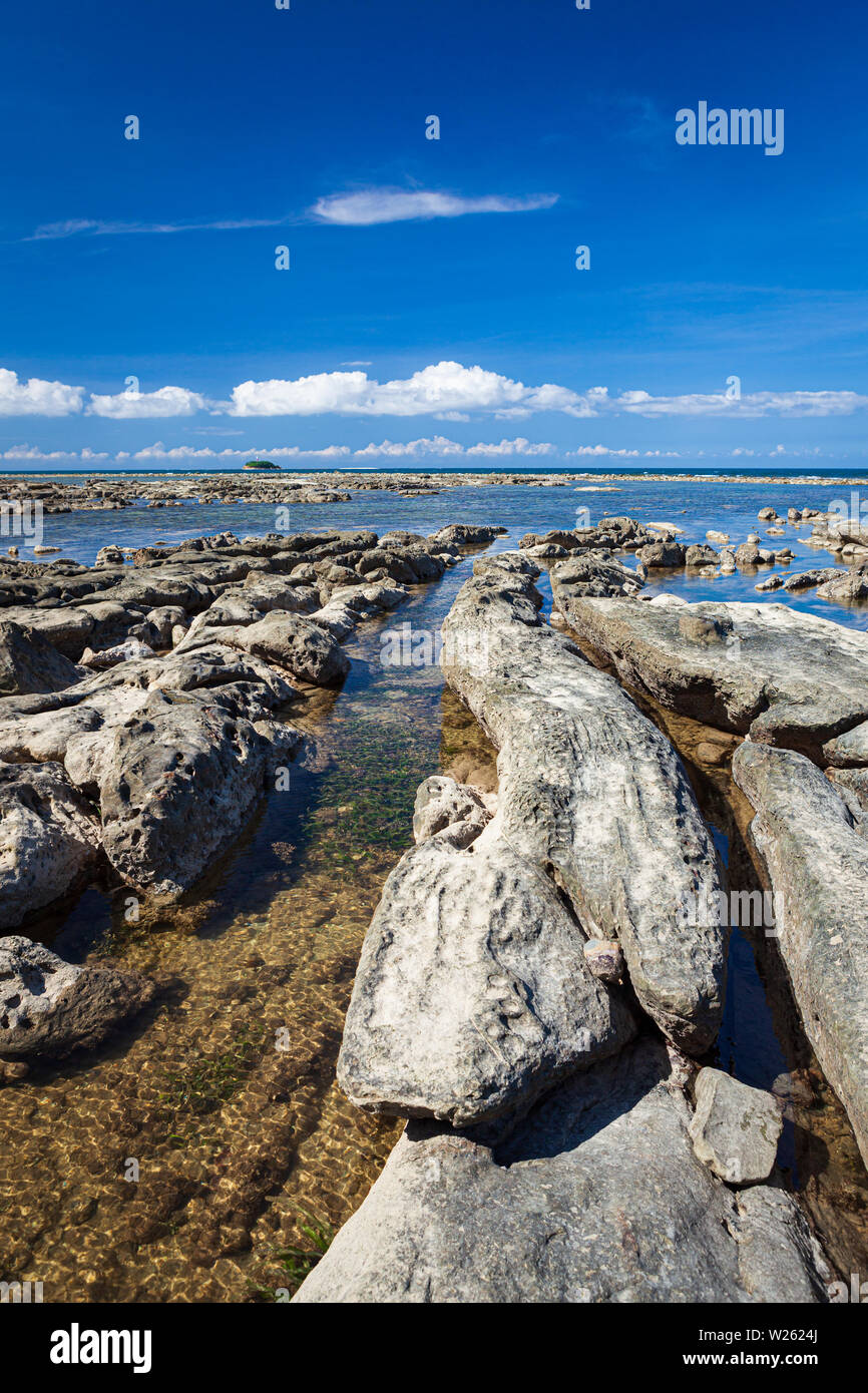 Rock formations at beach in tip of Borneo Stock Photo - Alamy